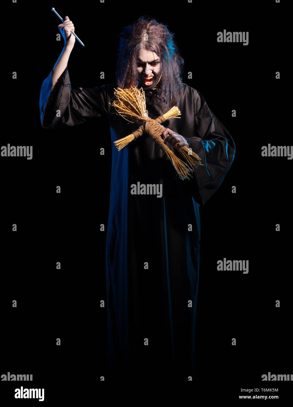 Scary witch isolated on black version Stock Photo - Alamy