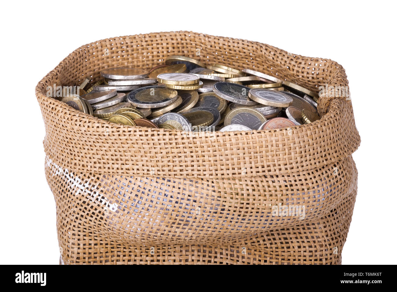 Money bag with coins isolated at a white background Stock Photo - Alamy