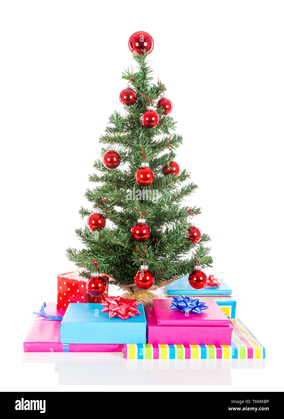 Christmas tree with red balls and gifts isolated at white Stock Photo ...