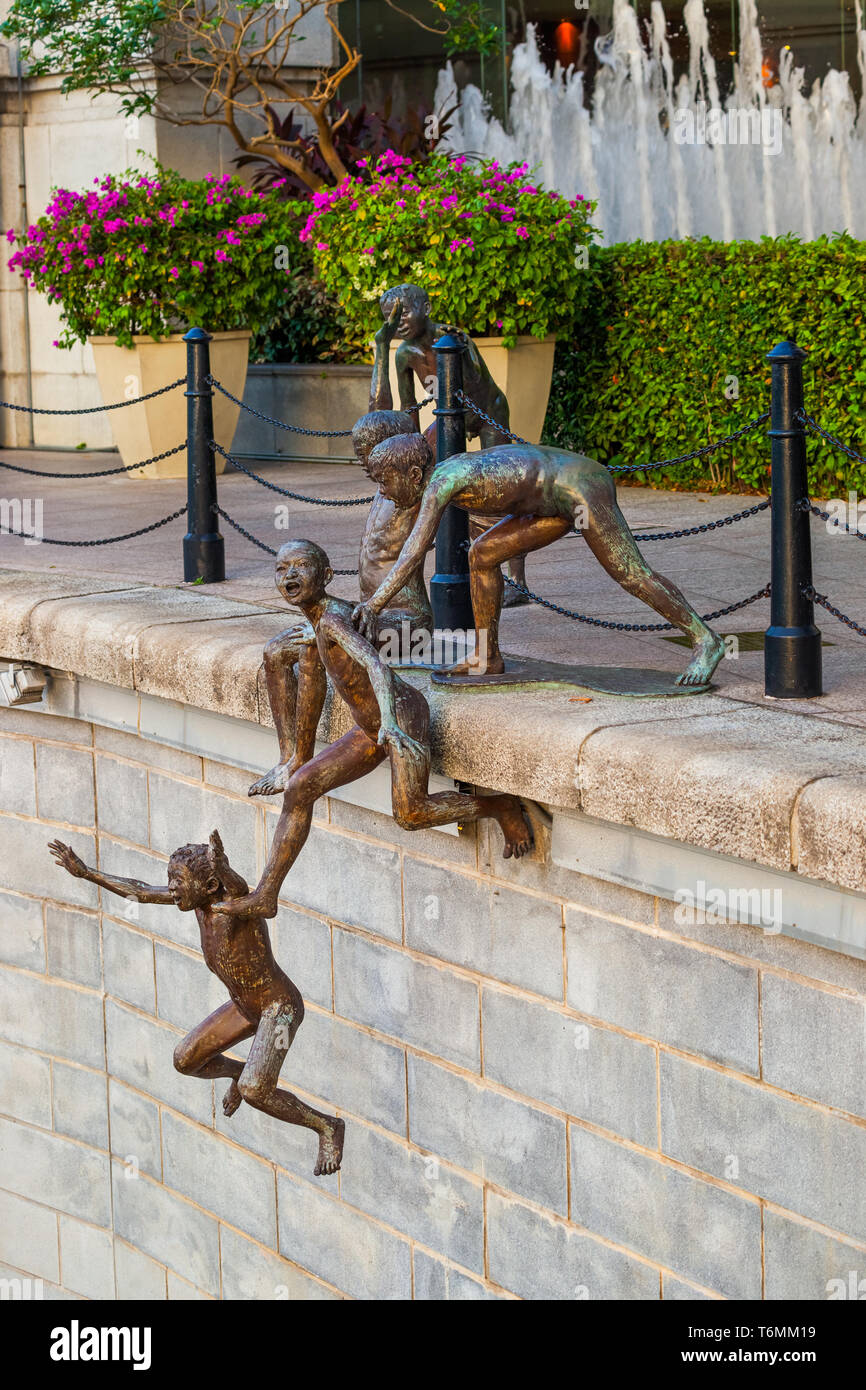 Sculpture First Generation in Singapore Stock Photo - Alamy