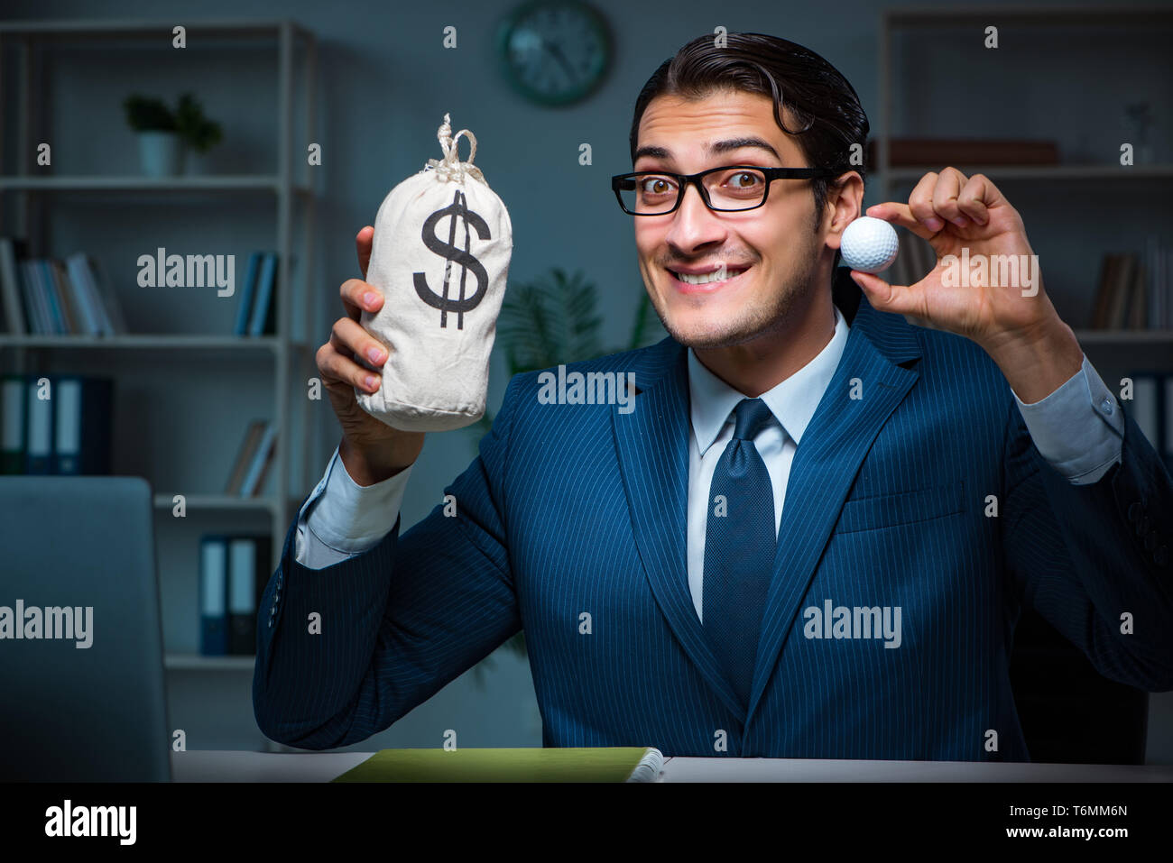 Business executive playing golf hi-res stock photography and images - Alamy