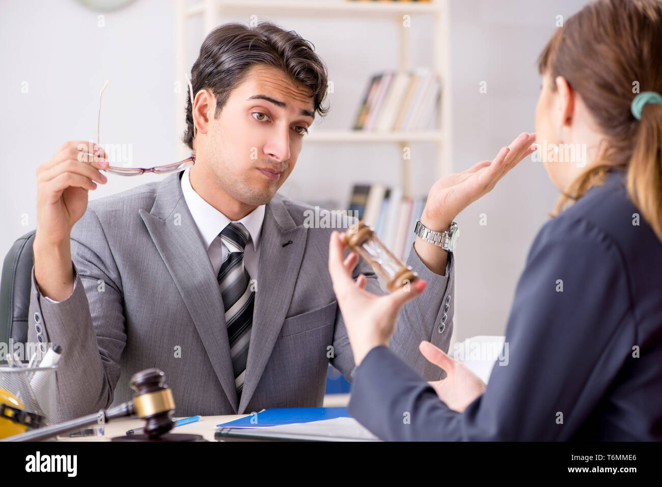 Lawyer talking to client in office Stock Photo - Alamy