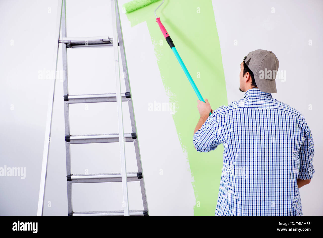 Back view man painter working hi-res stock photography and images - Alamy