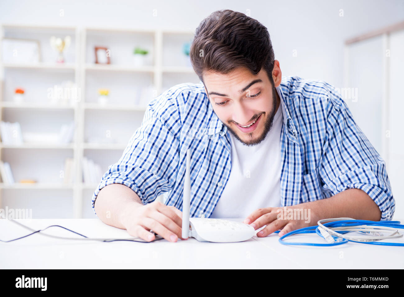 Man enjoying fast internet connection Stock Photo - Alamy