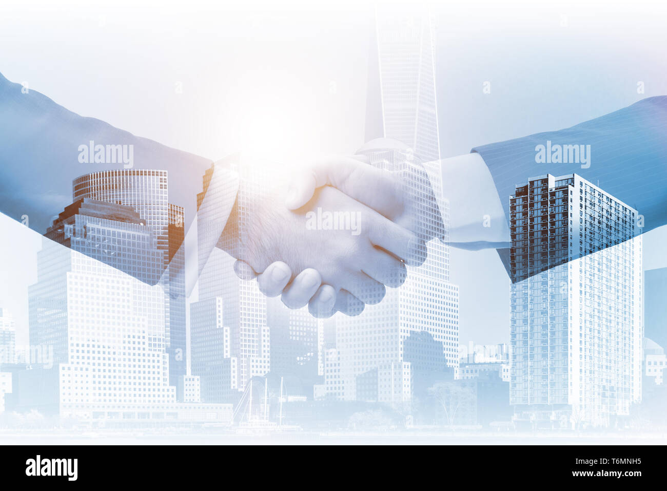 Concept of cooperation with handshake Stock Photo - Alamy