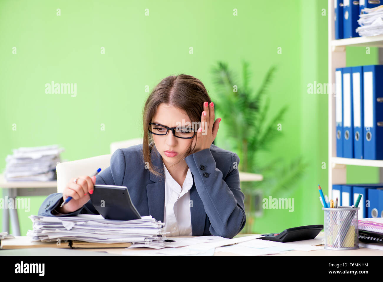 Female financial manager working in the office Stock Photo - Alamy