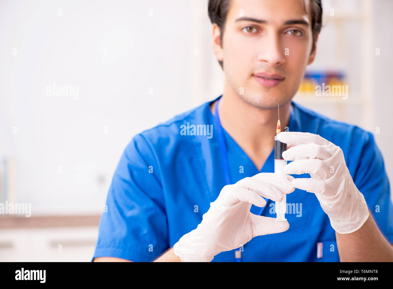 Young patient during blood test sampling procedure Stock Photo - Alamy