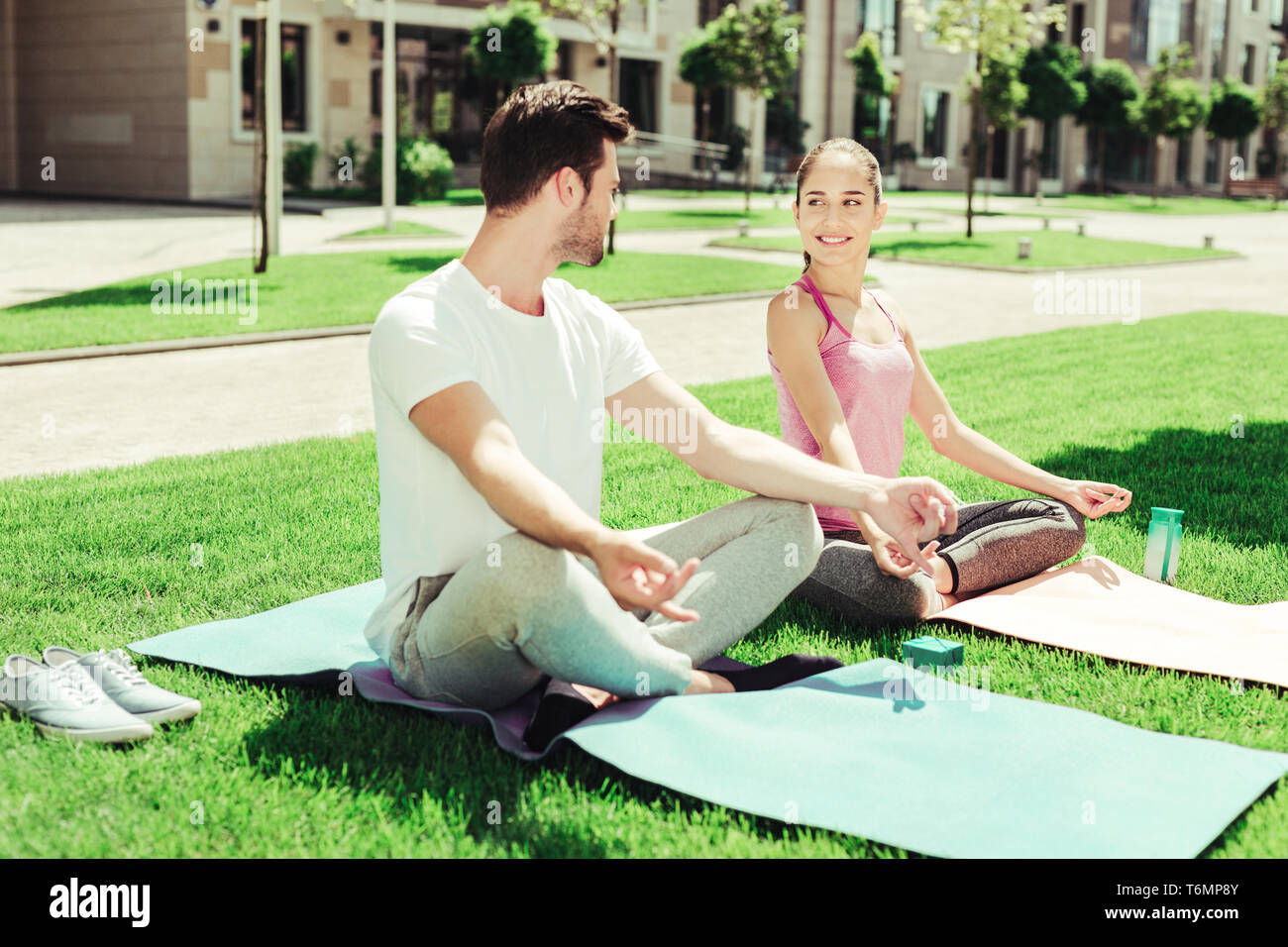 Cheerful young people talking while enjoying fresh air Stock Photo - Alamy