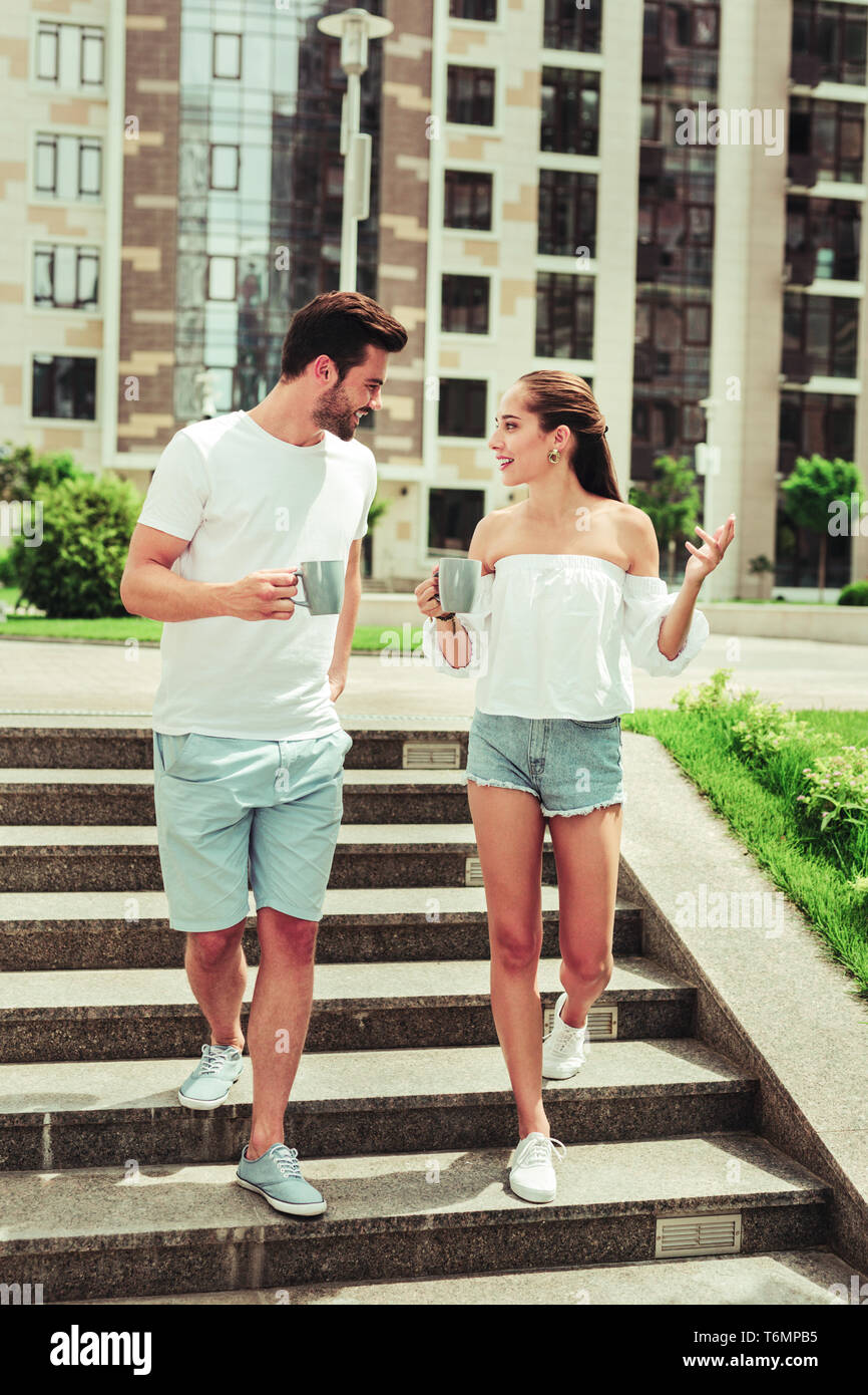 Beautiful brunette female person having pleasant conversation Stock ...