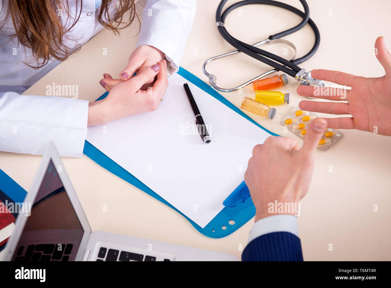 Man visiting doctor for routine check-up Stock Photo - Alamy
