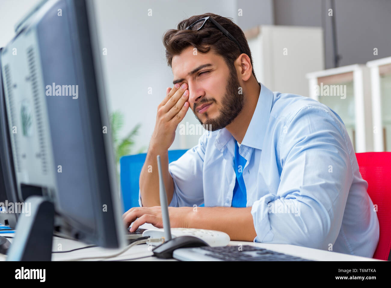 Frustrated young man due to weak internet reception Stock Photo - Alamy