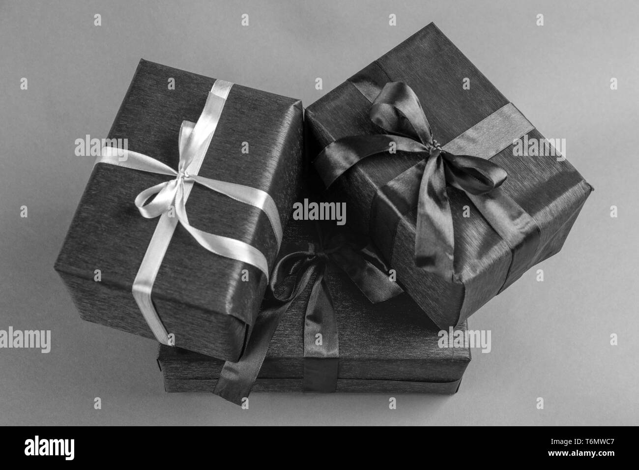 Elegant gift boxes on gray background Stock Photo - Alamy