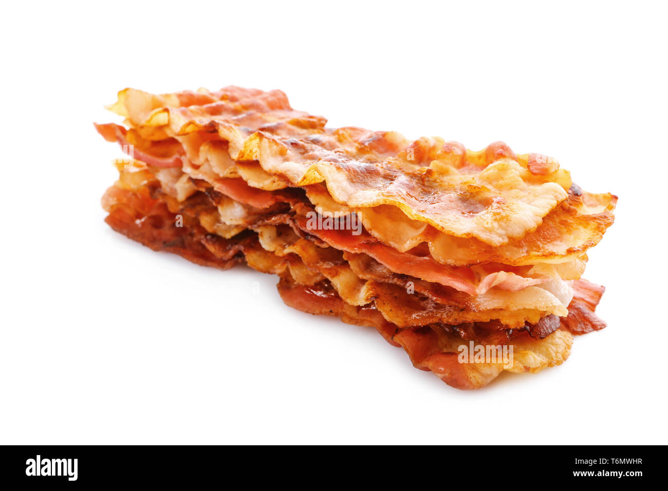 Fried bacon rashers on white background Stock Photo - Alamy