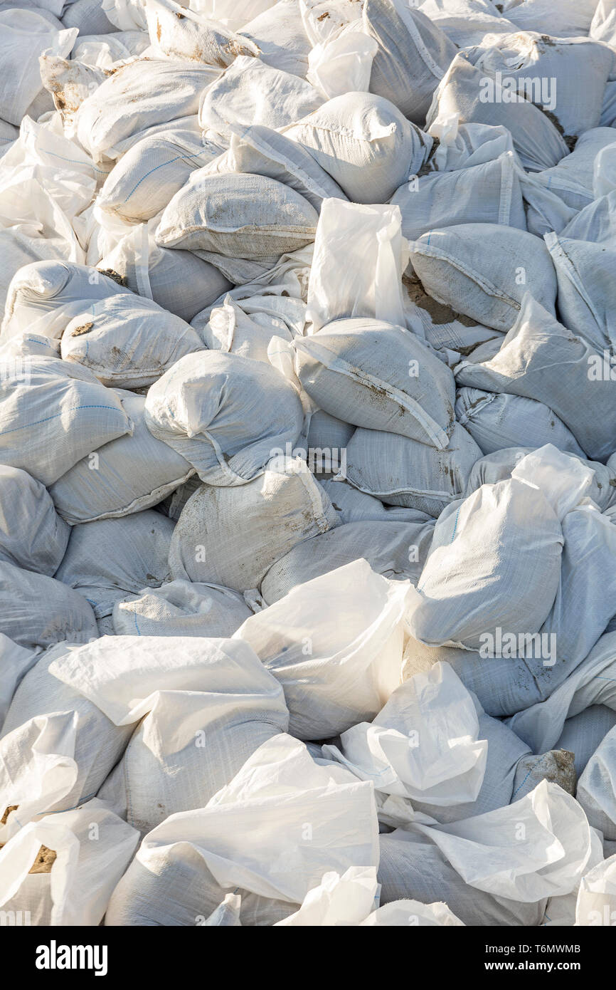 Pile of sandbags hi-res stock photography and images - Alamy