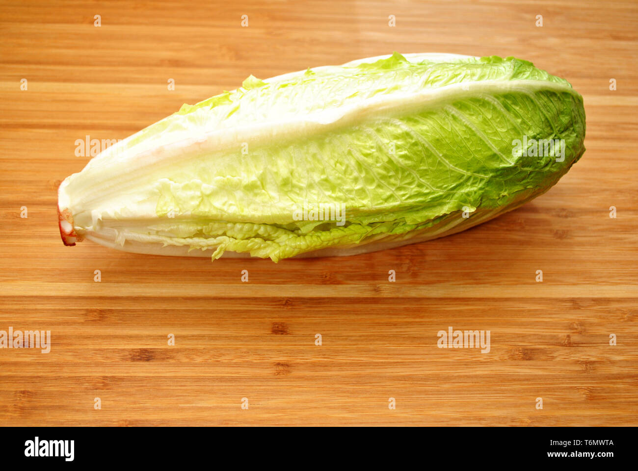 Cutting long leaf lettuce hi-res stock photography and images - Alamy