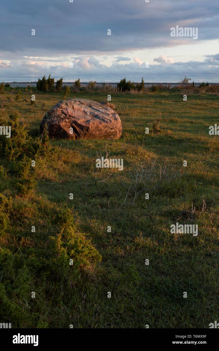 Rock in sunset Stock Photo - Alamy