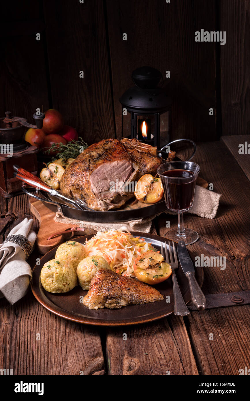 classic and crispy roasted duck with cabbage and dumplings Stock Photo ...