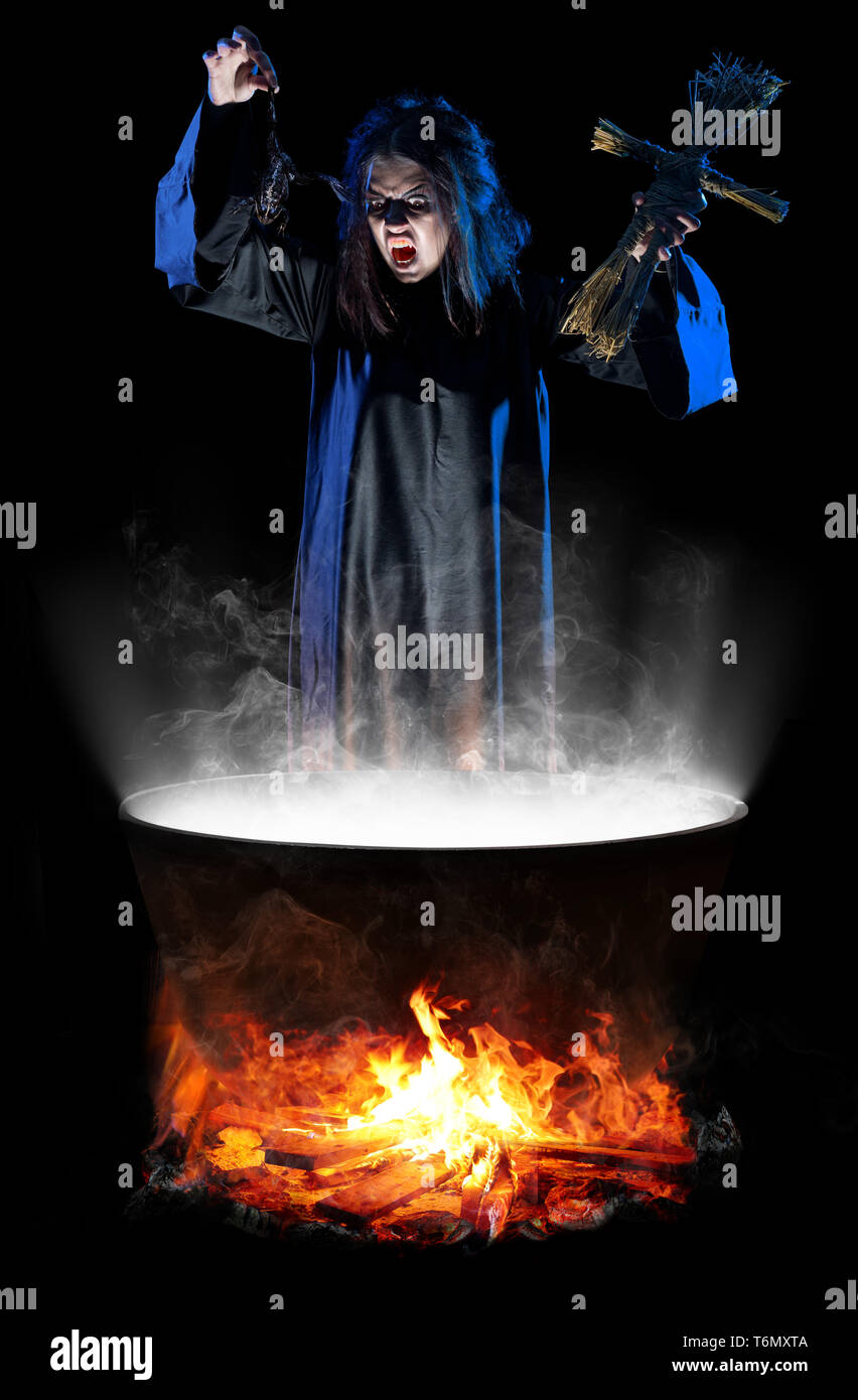 Scary witch isolated on black Stock Photo - Alamy