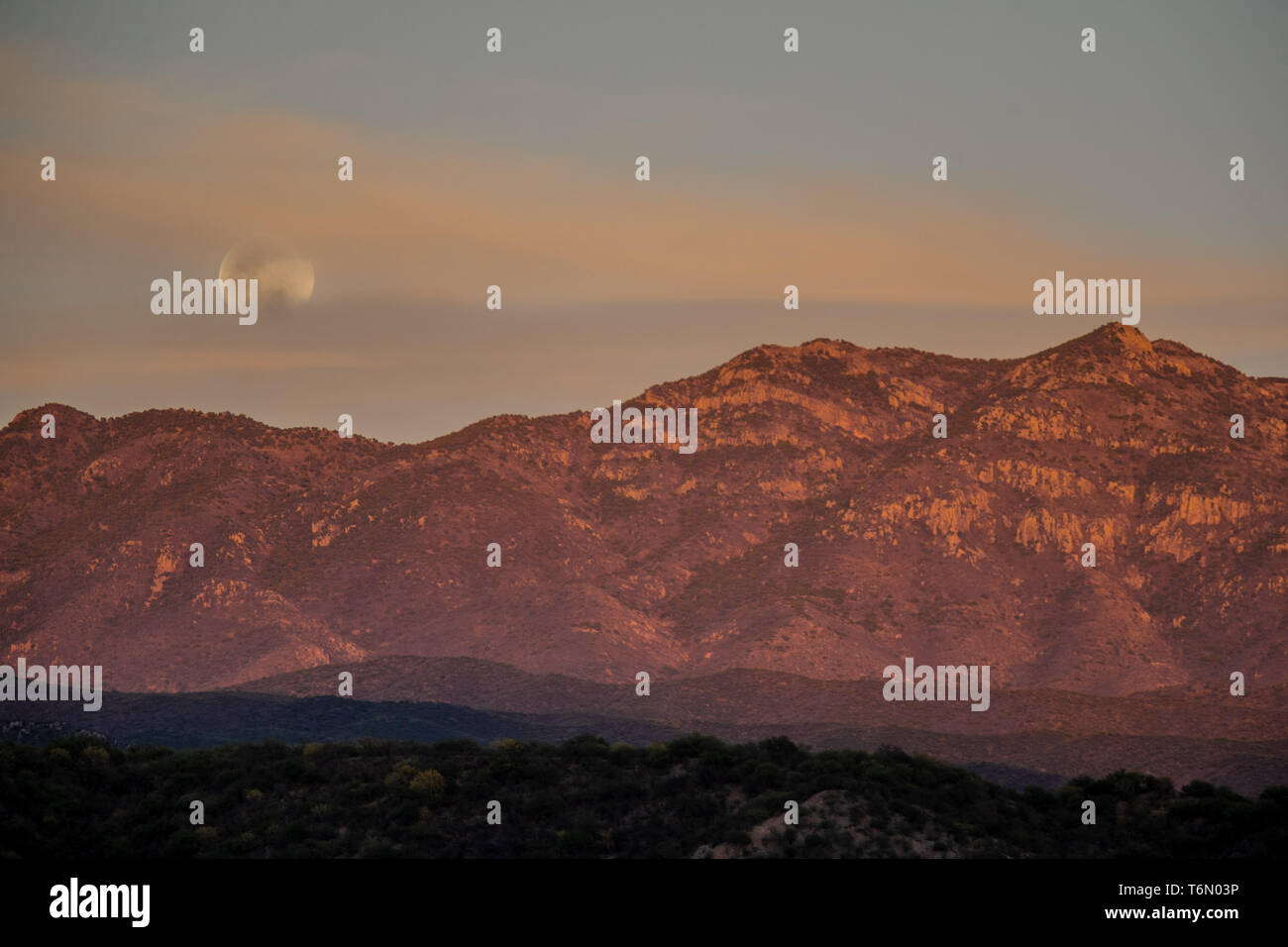 Full moon seen over the hills of the Ruta de la Sierra and near ...