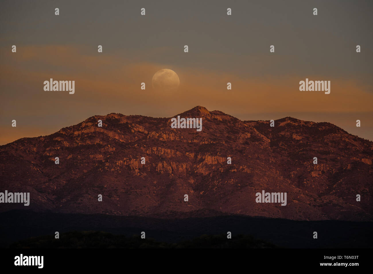 Full moon seen over the hills of the Ruta de la Sierra and near ...