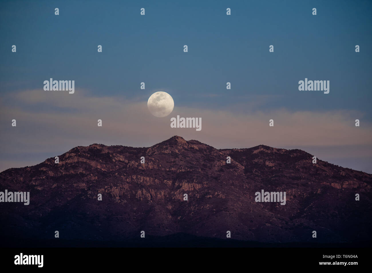 Full moon seen over the hills of the Ruta de la Sierra and near ...