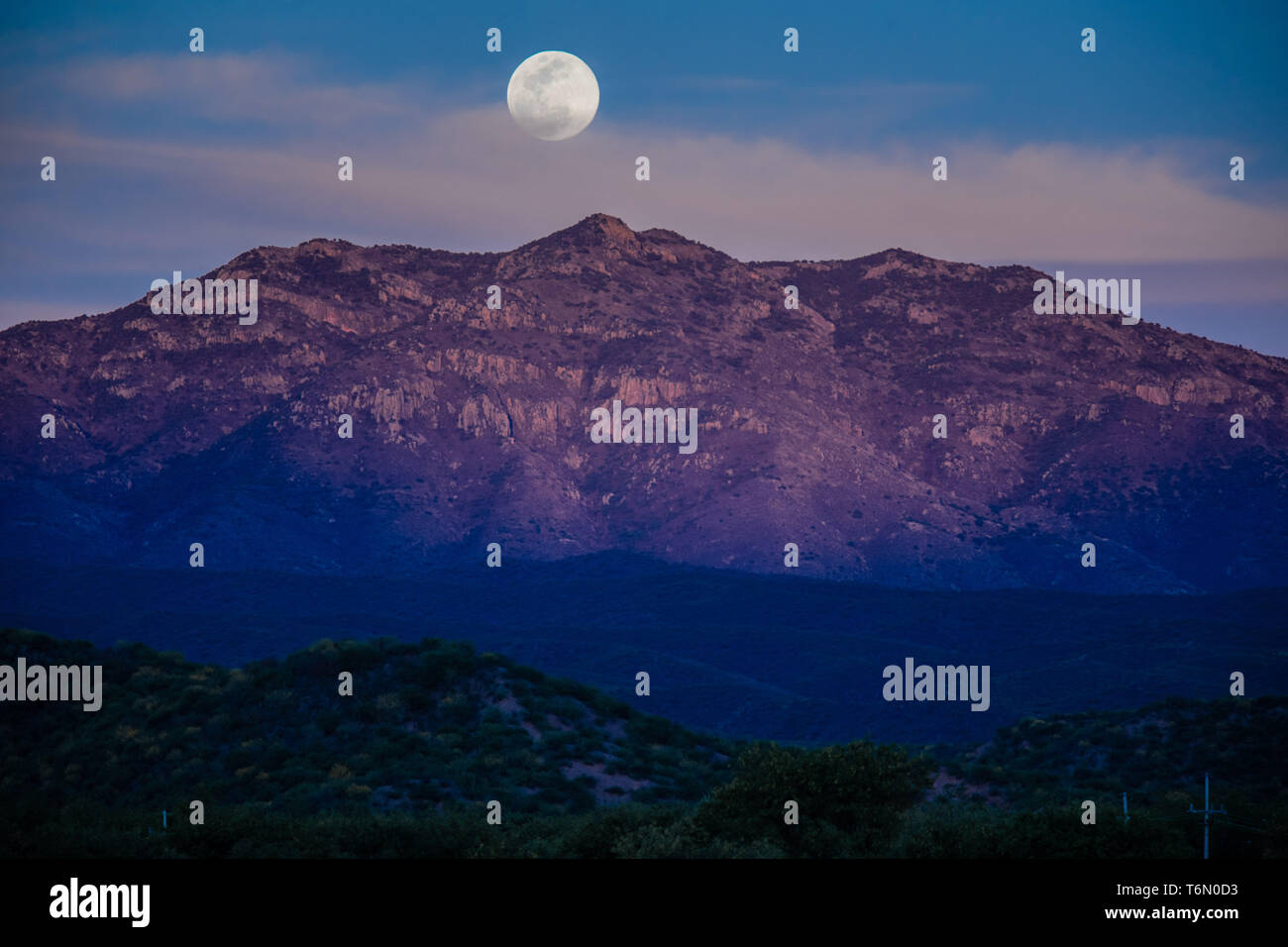 Full moon seen over the hills of the Ruta de la Sierra and near ...