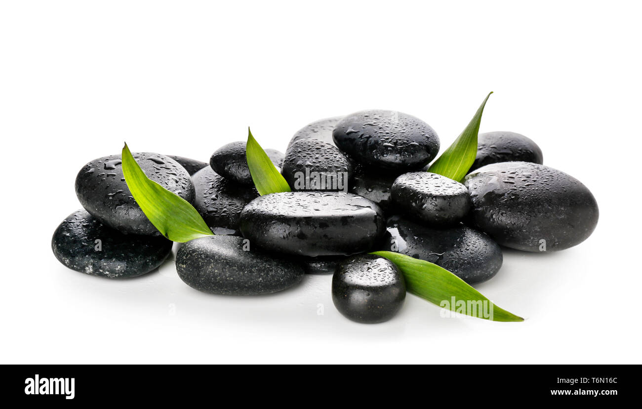 Spa stones on white background Stock Photo - Alamy