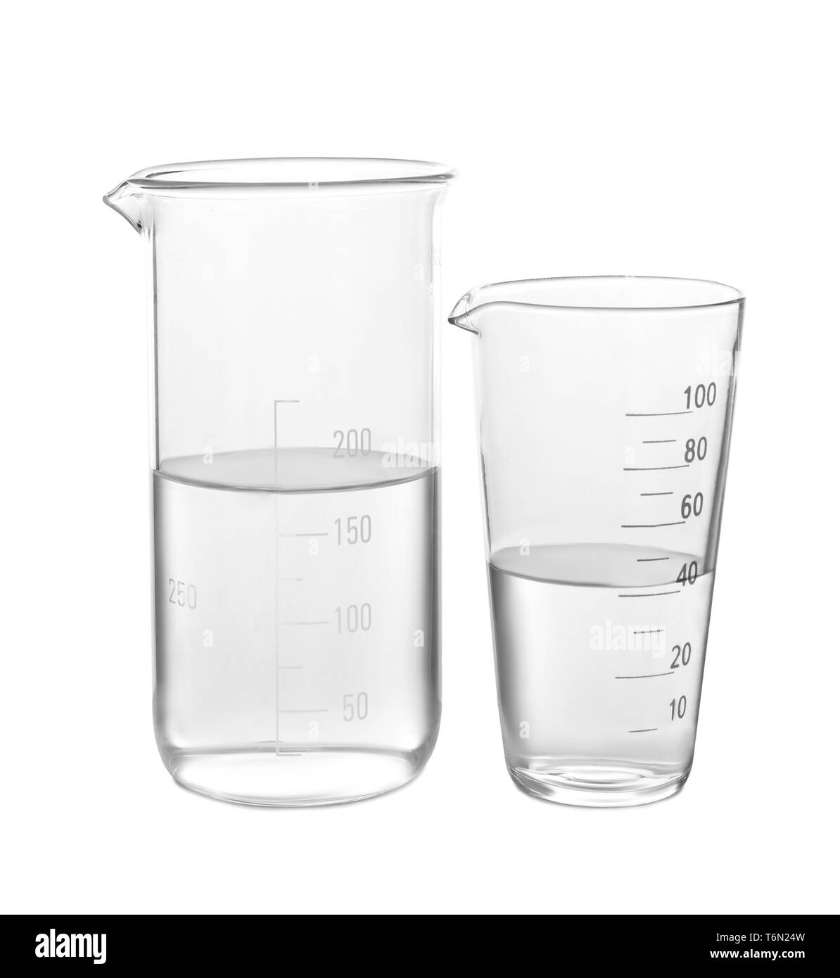 Glass beakers with water on white background Stock Photo - Alamy