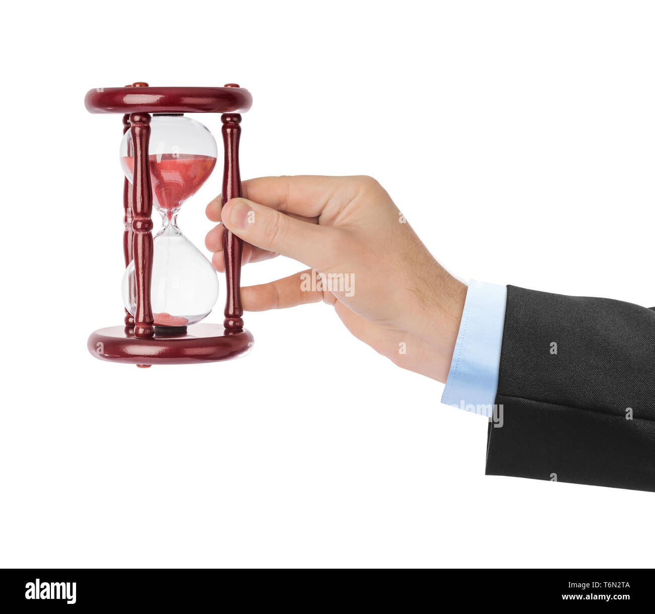 Hand holding hourglass Cut Out Stock Images & Pictures - Alamy