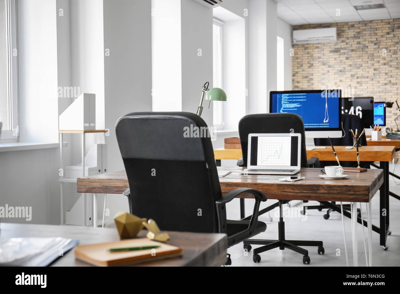 Office interior with computers and tables. Workplace design Stock Photo ...