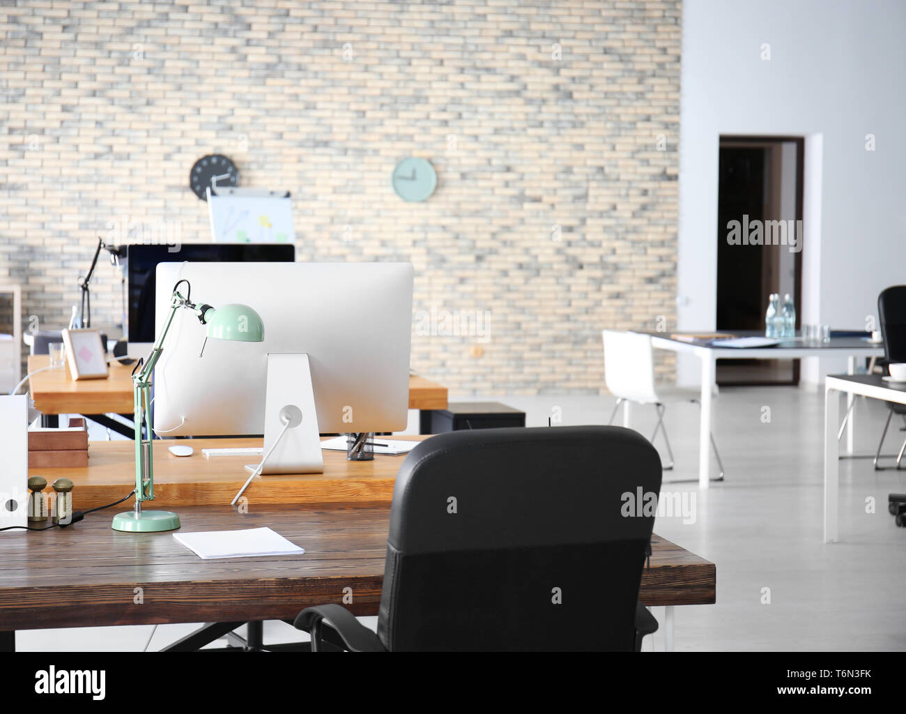 Office interior with tables and armchairs. Workplace design Stock Photo ...