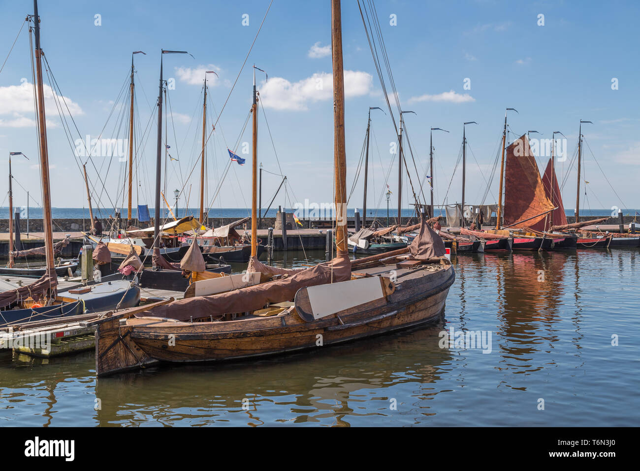 Dutch harbor of Urk with traditional wooden fishing boats Stock Photo ...
