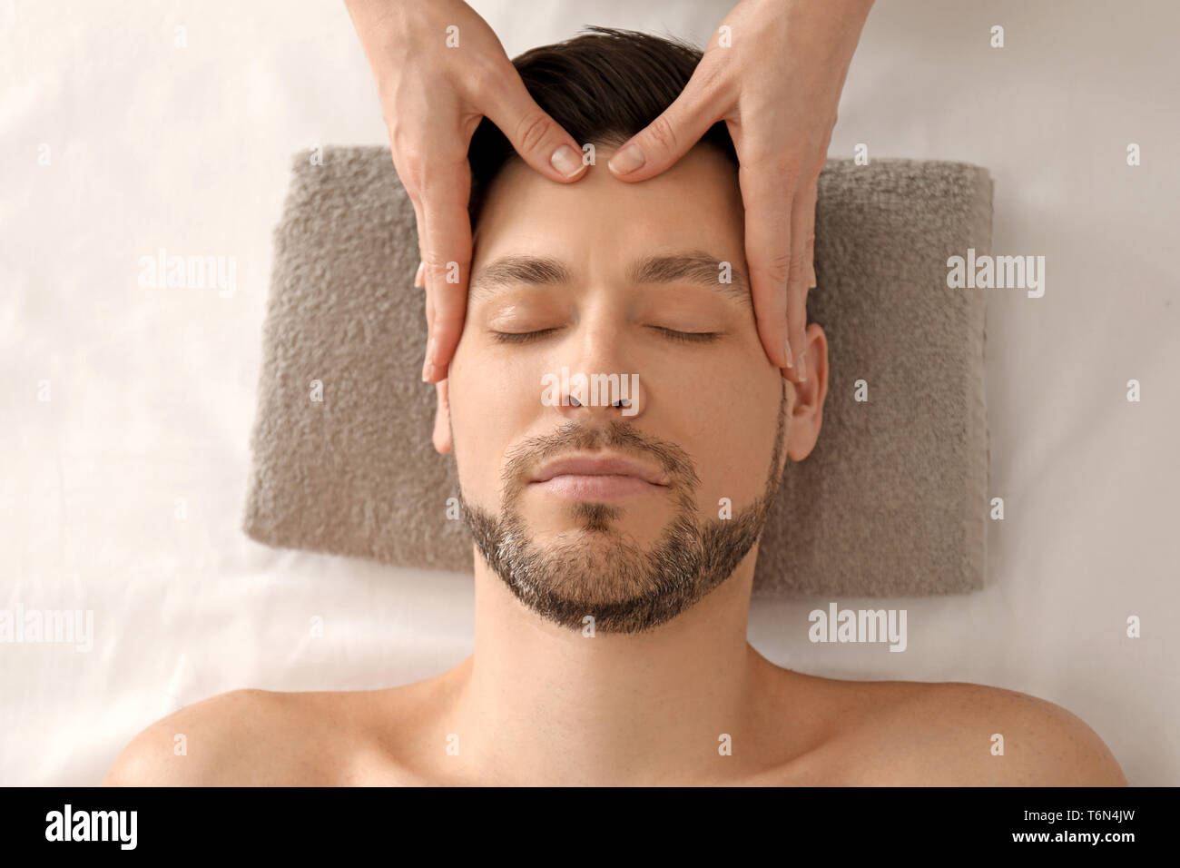 Man having head massage hi-res stock photography and images - Alamy