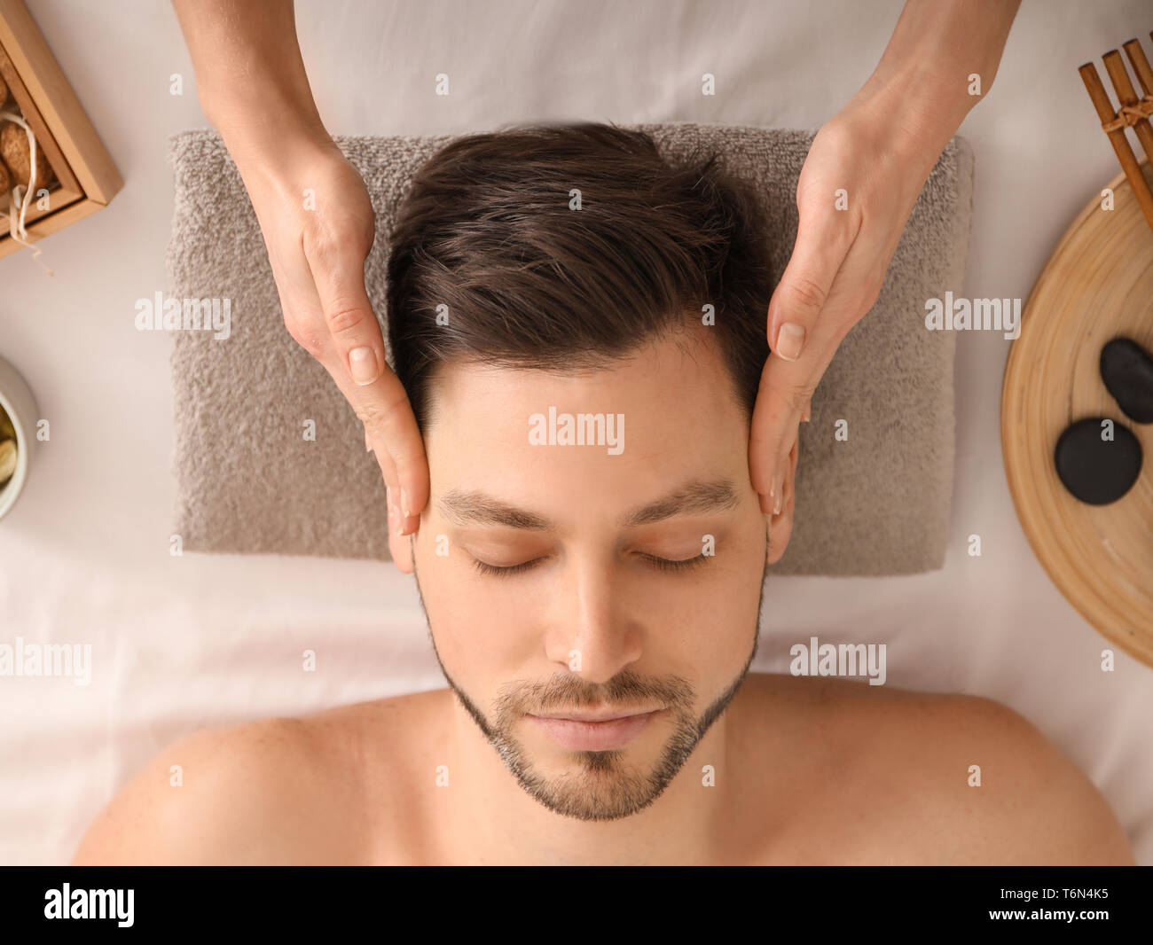 Man having head massage hi-res stock photography and images - Alamy