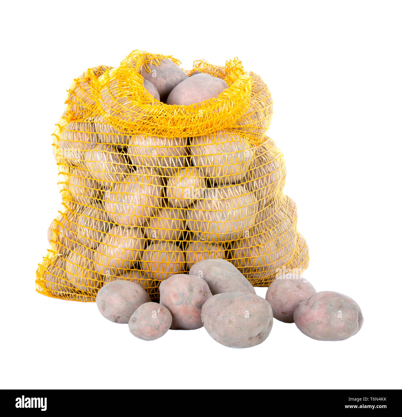 Potatoes in a bag over a white background Stock Photo - Alamy