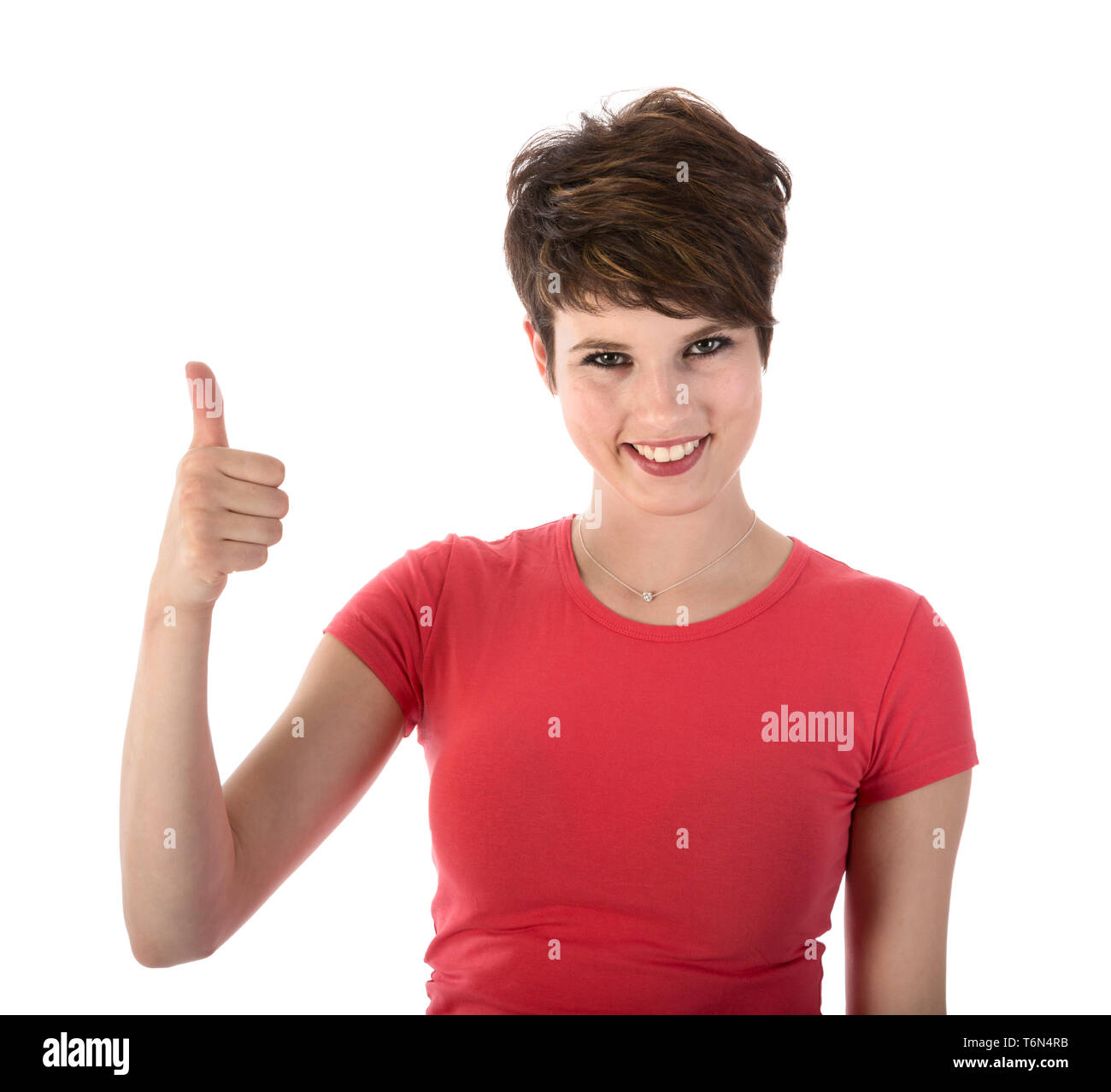 Pretty young woman showing thumbs up Stock Photo - Alamy