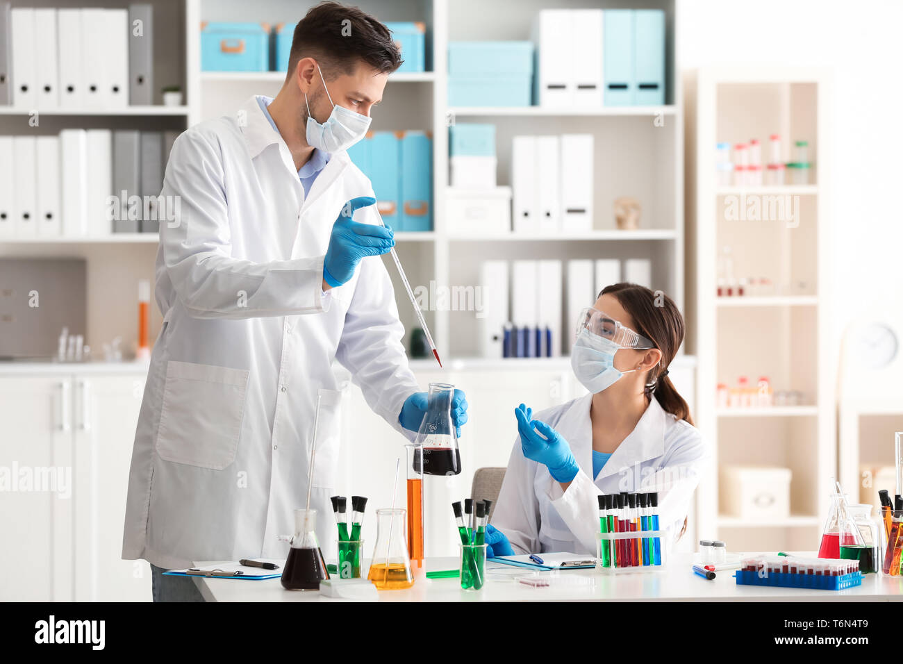 Scientists working in laboratory Stock Photo - Alamy