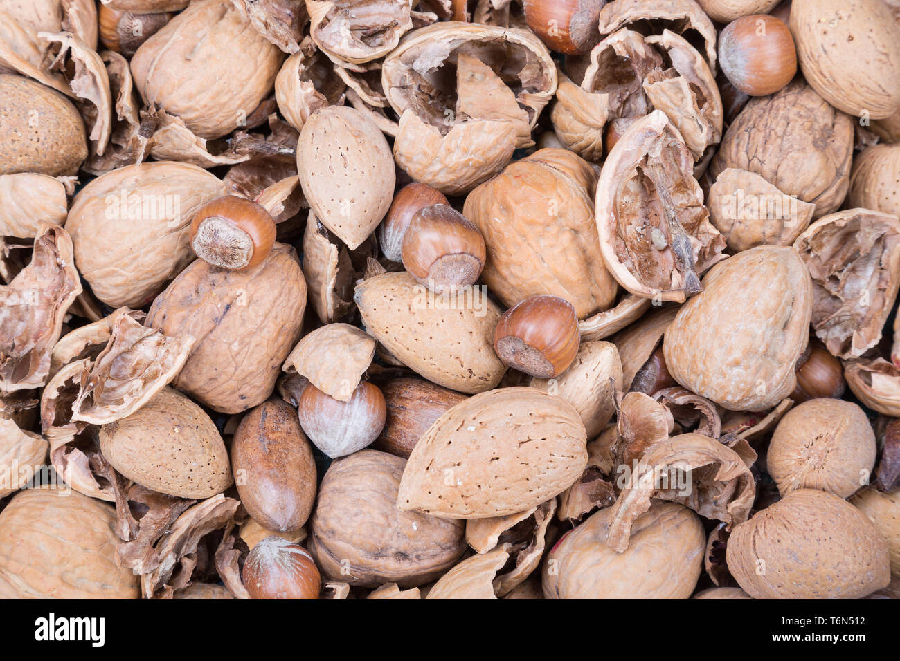 Pile of several nuts and nutshells Stock Photo - Alamy