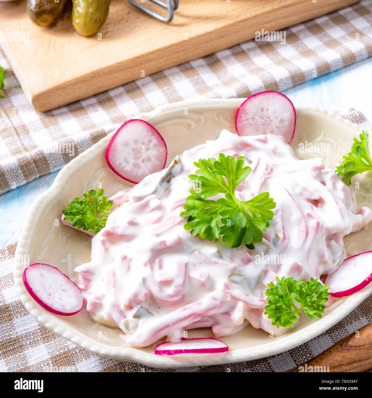 delicious homemade meat salad with mayonnaise and cucumber Stock Photo ...
