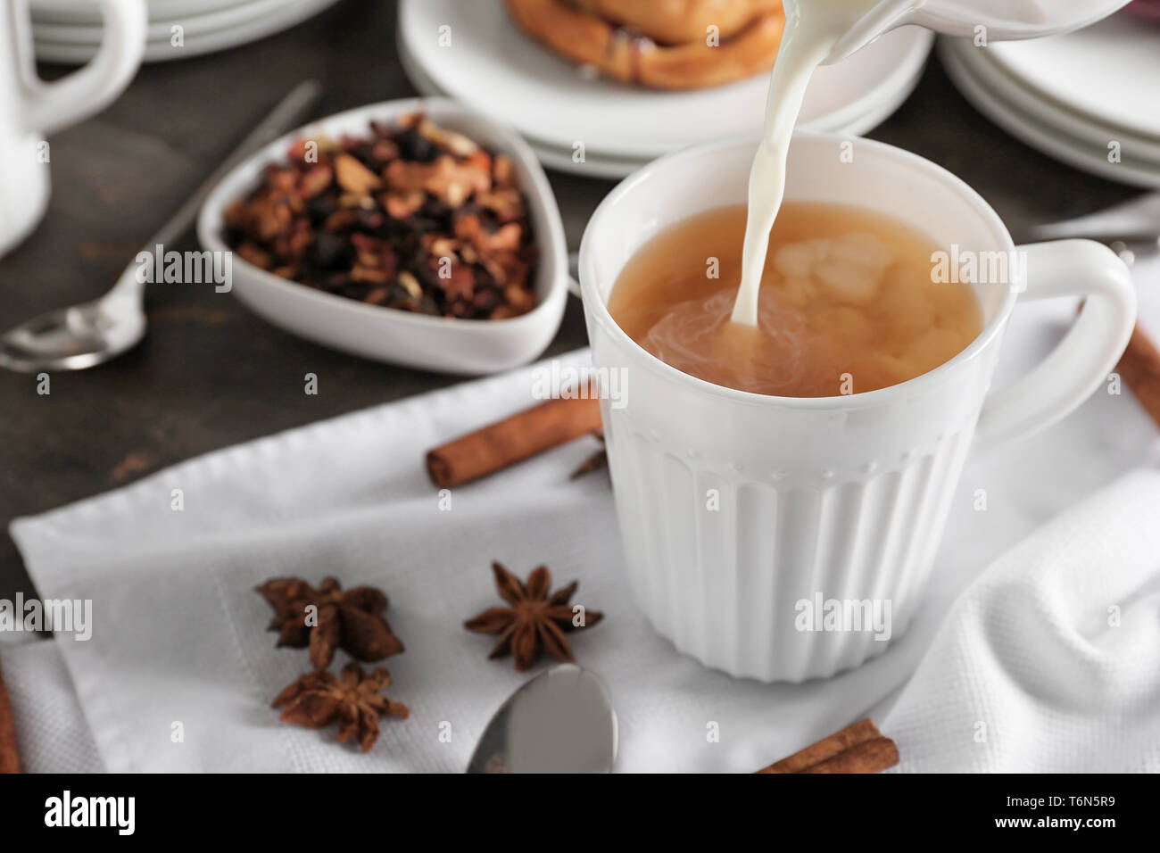 Adding milk to hi-res stock photography and images - Alamy