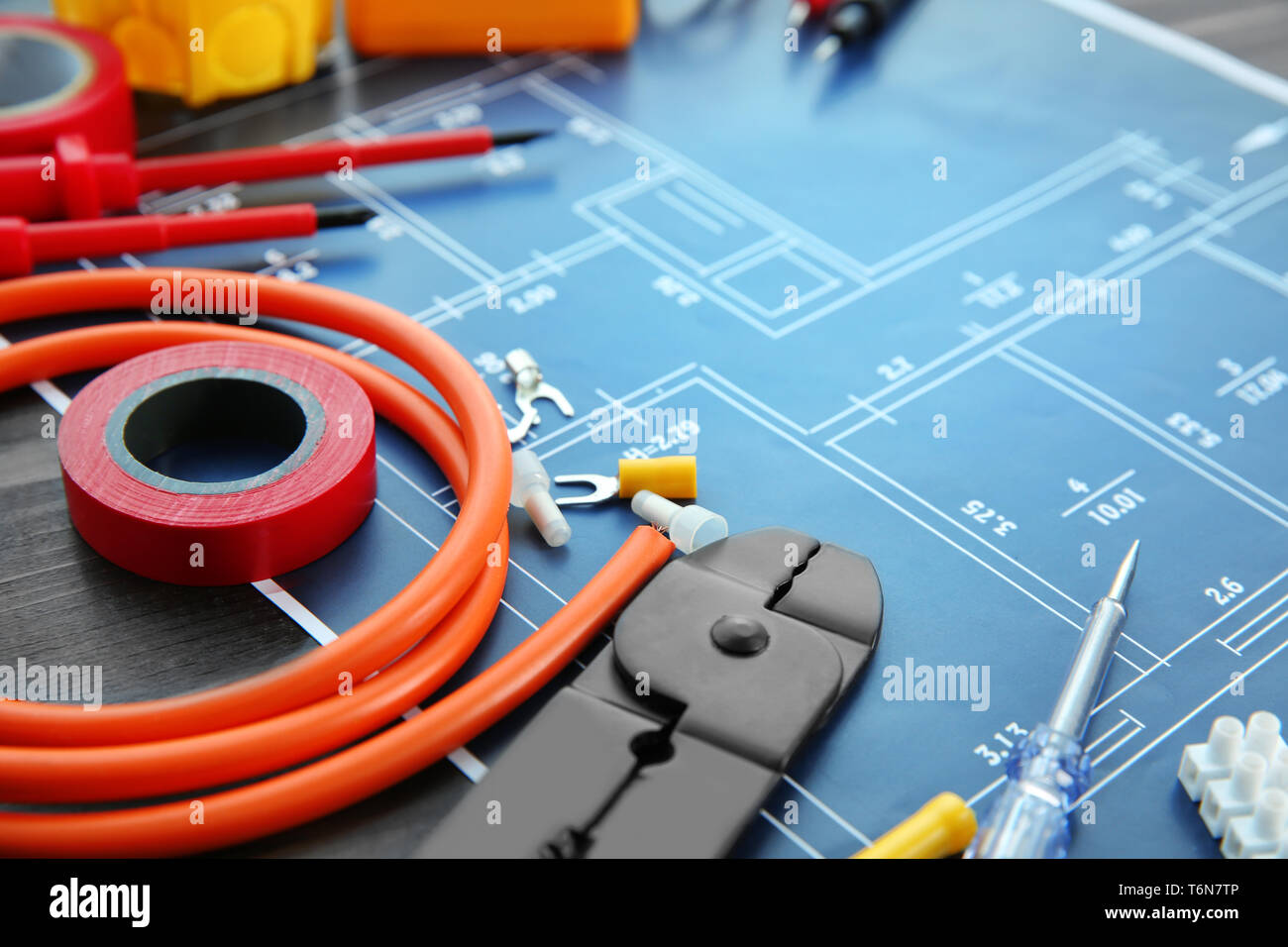 Different electrical tools on house plan, closeup Stock Photo - Alamy