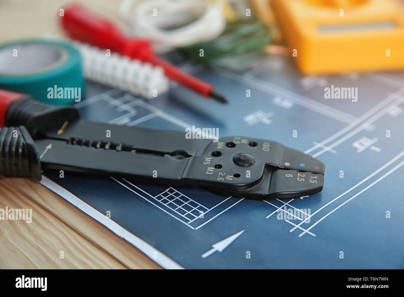 Different electrical tools on house plan, closeup Stock Photo - Alamy