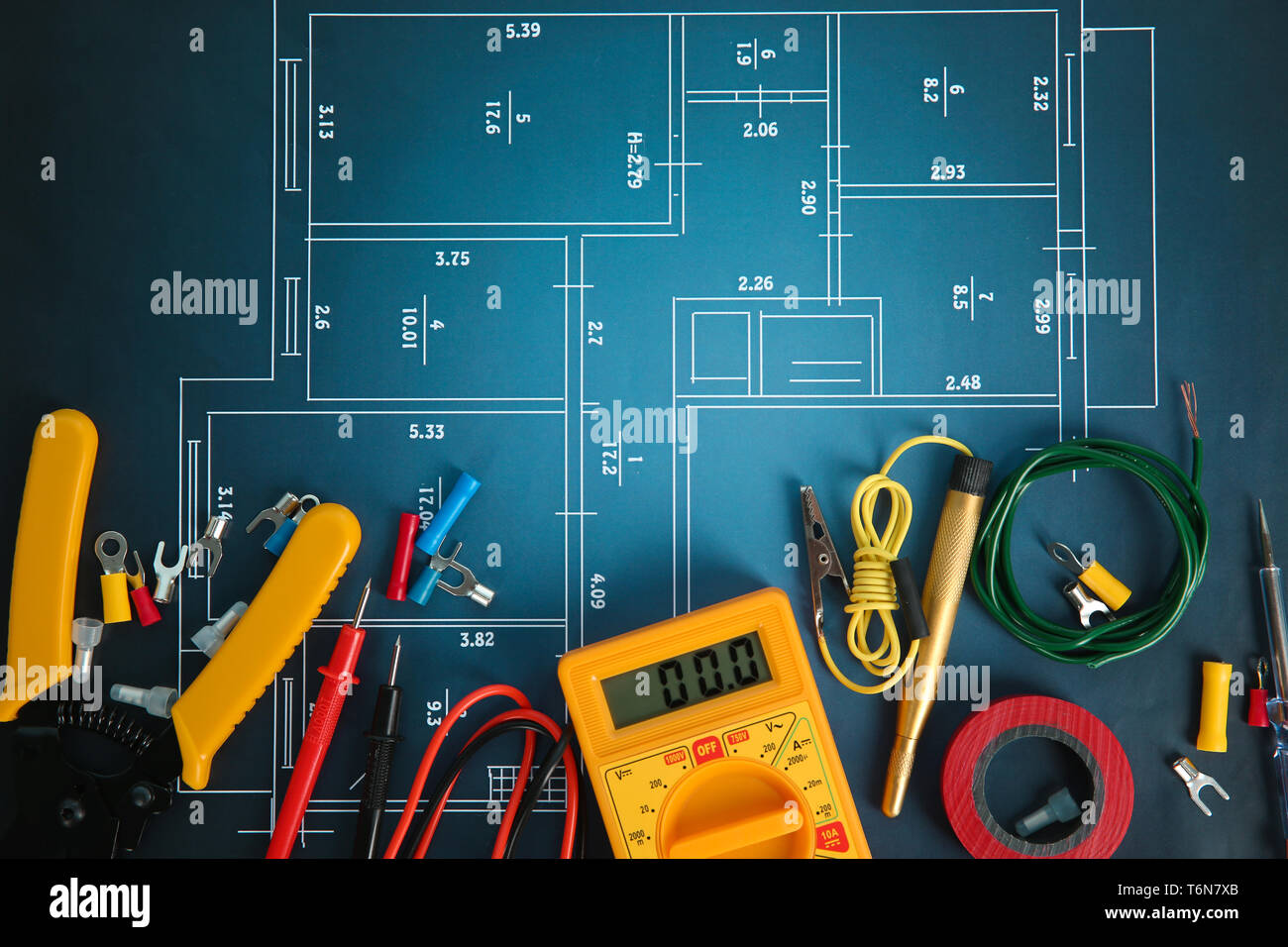 Flat lay composition with electrical tools on house plan Stock Photo ...