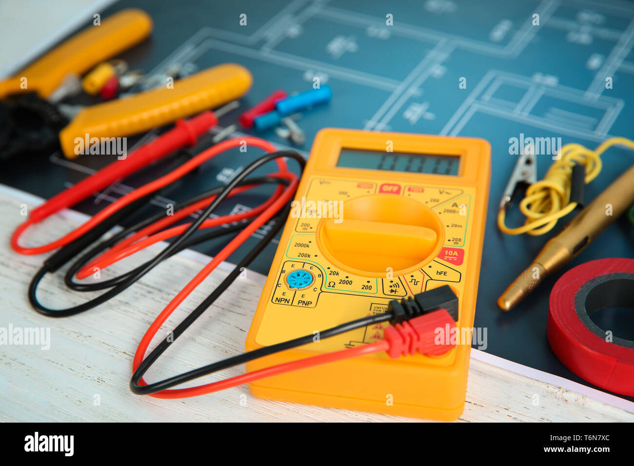 Different electrical tools on house plan, closeup Stock Photo - Alamy