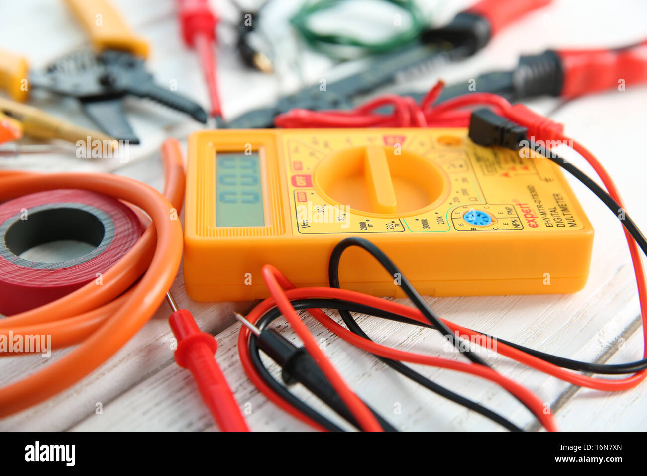 Different electrical tools on wooden background Stock Photo - Alamy
