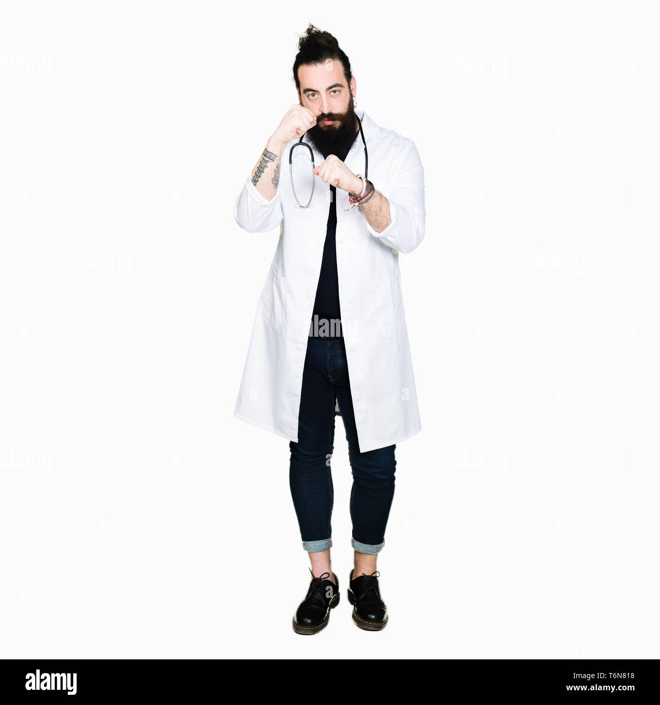 Doctor with long hair wearing medical coat and stethoscope Ready to ...