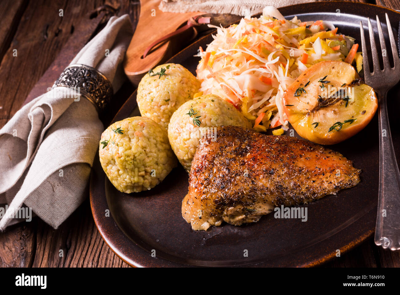 classic and crispy roasted duck with cabbage and dumplings Stock Photo ...