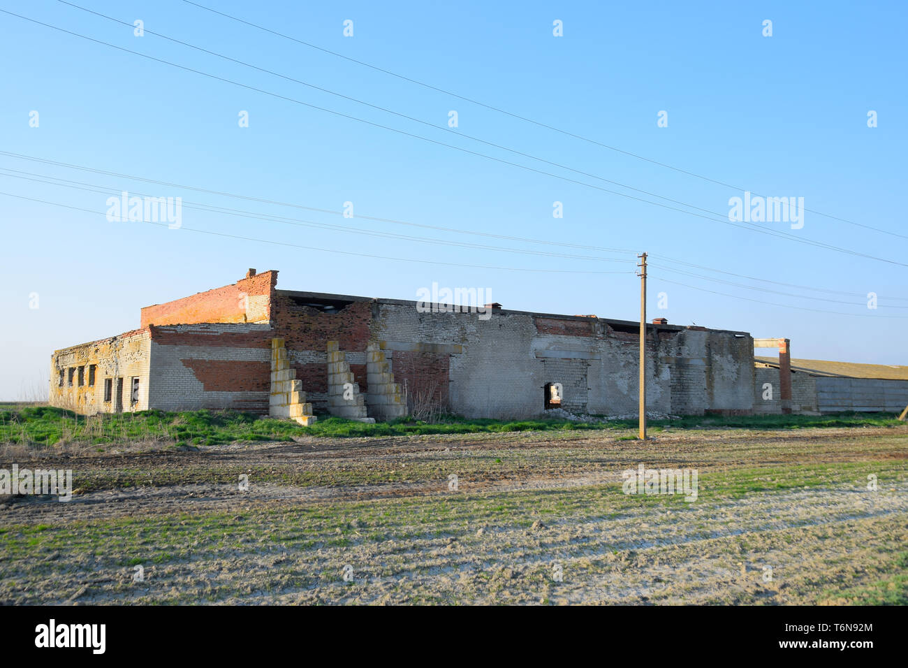 Old soviet brick abandoned building. Collapsing brick construction ...