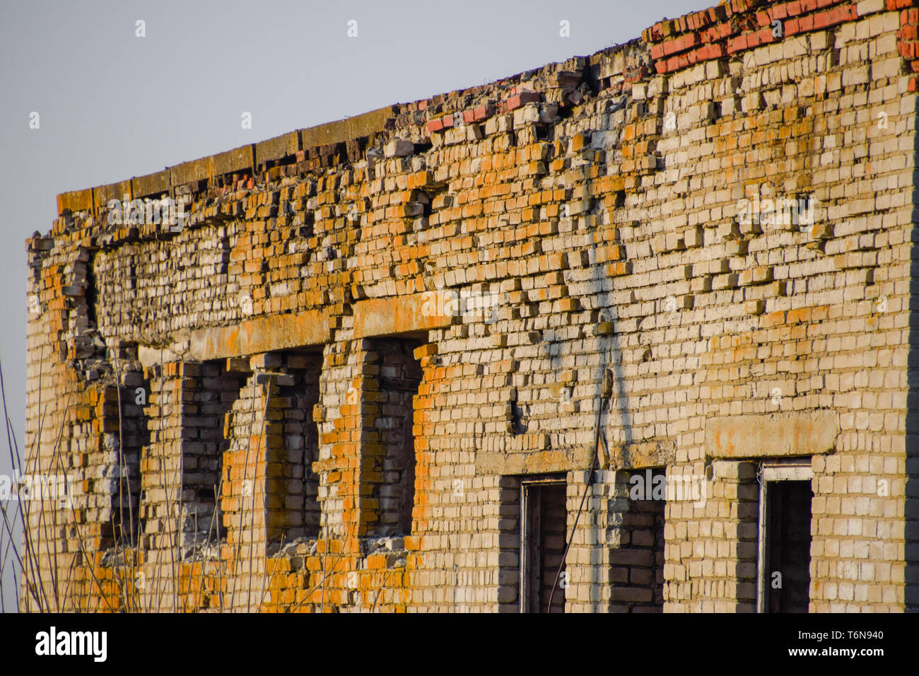 Old soviet brick abandoned building. Collapsing brick construction ...