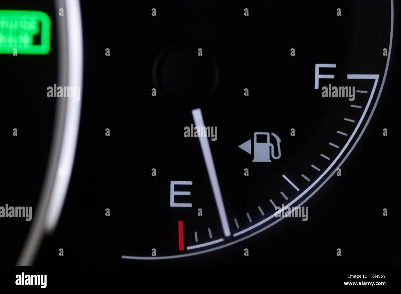 Car fuel indicator on dashboard close up view Stock Photo - Alamy